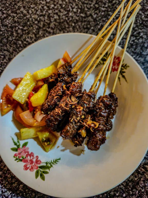 A Plate of Maranggi Satay is Served on the Table in an Attractive ...