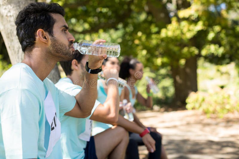 Marathon Athletes Having Water Stock Photo - Image of resting ...