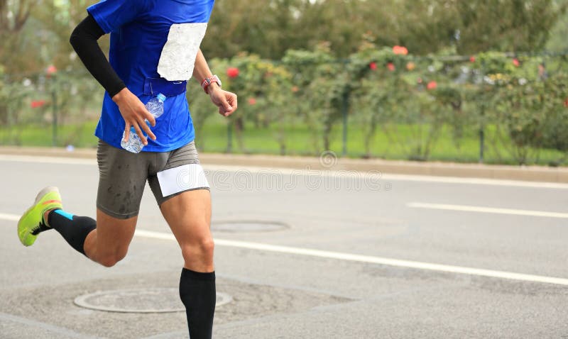 Marathon Runner Running on City Road Stock Image - Image of endurance ...