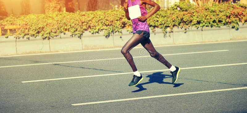 Marathon Runner Running on City Road Stock Image - Image of race, fast ...