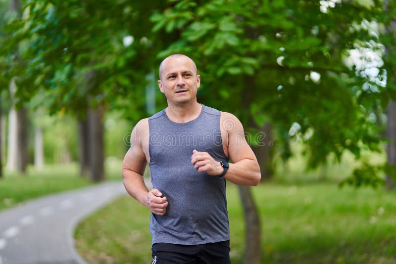 Marathon Runner Training in the Park Stock Photo - Image of people ...