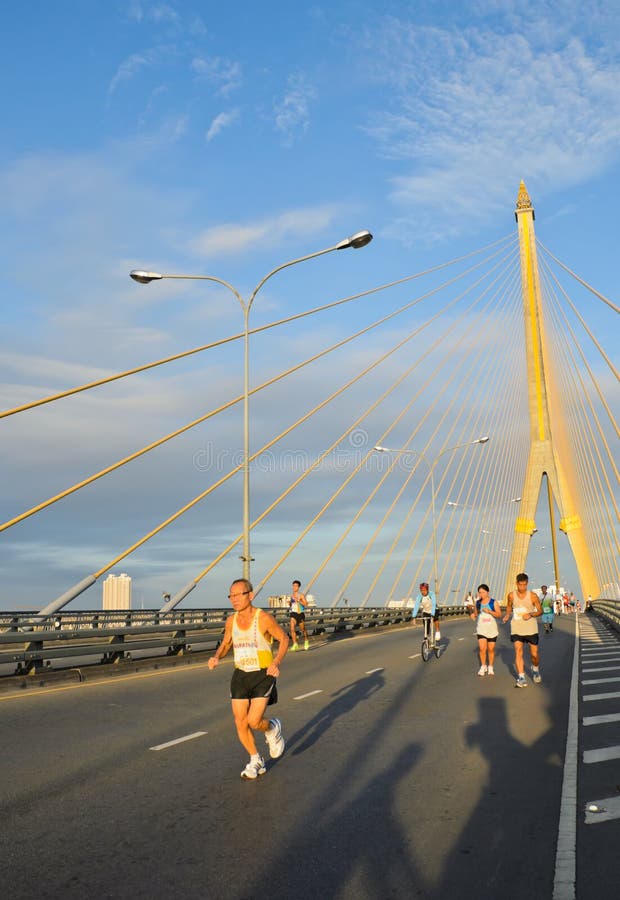 Marathon Runners Across Cable Bridge Editorial Photography - Image of ...