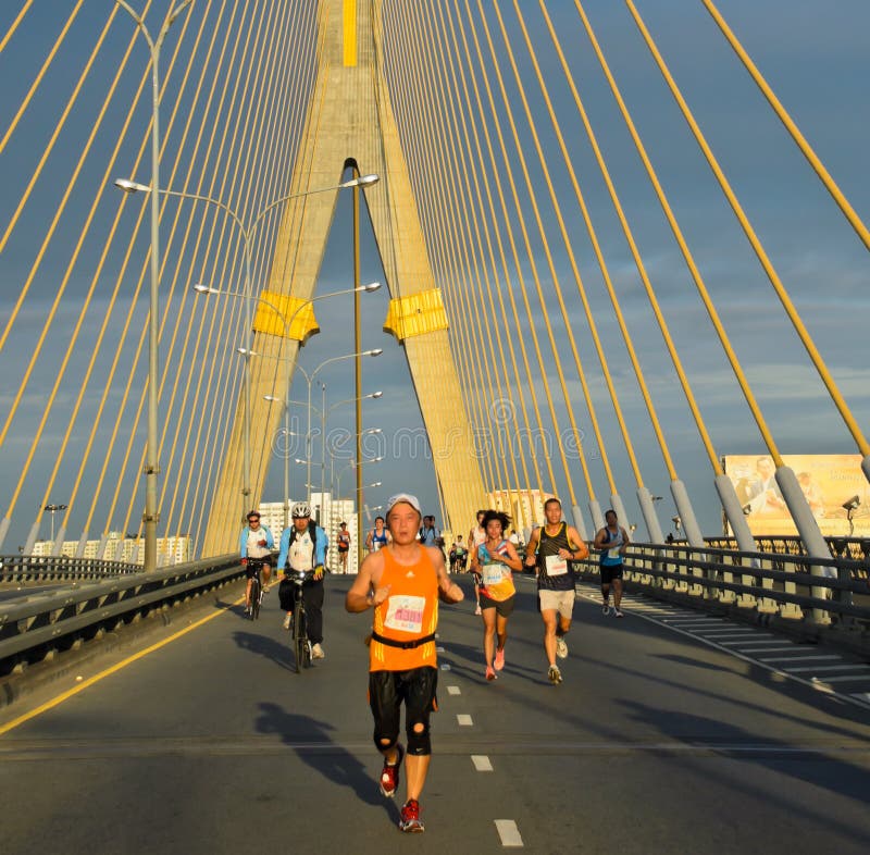 Marathon Runners Across Cable Bridge Editorial Photography - Image of ...