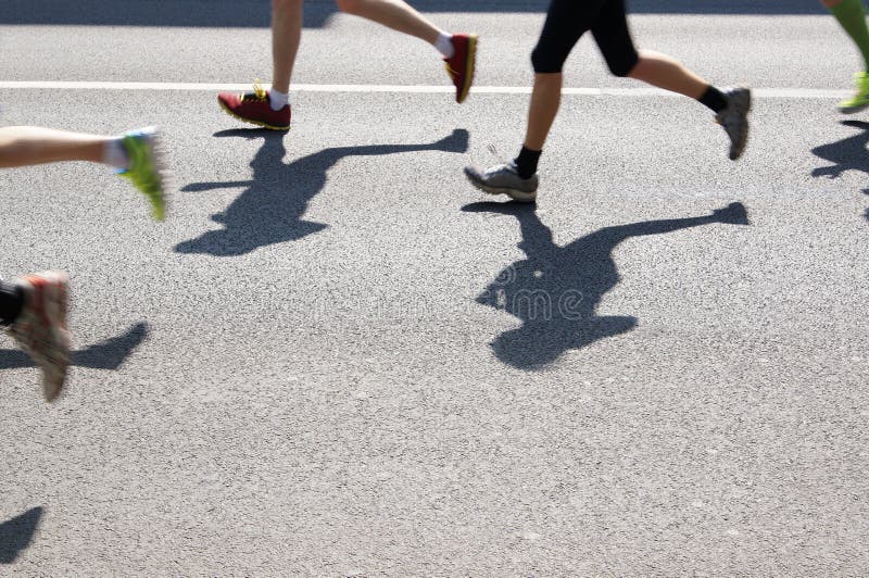Marathon Runners Running on Asphalt Stock Image - Image of space ...