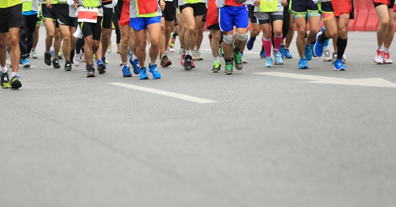 Marathon Runners Running on City Road Stock Image - Image of marathon ...