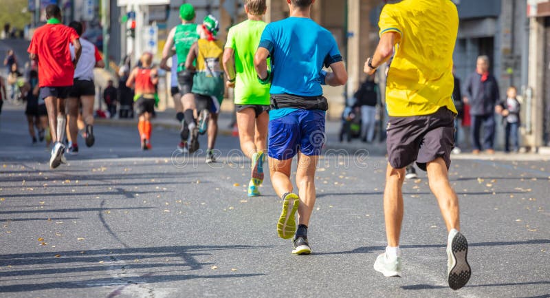Marathon Running Race, Runners Running on City Roads Editorial ...