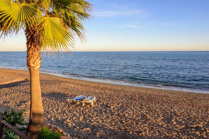 Marbella beach sunset stock photo. Image of water, spain - 61820504