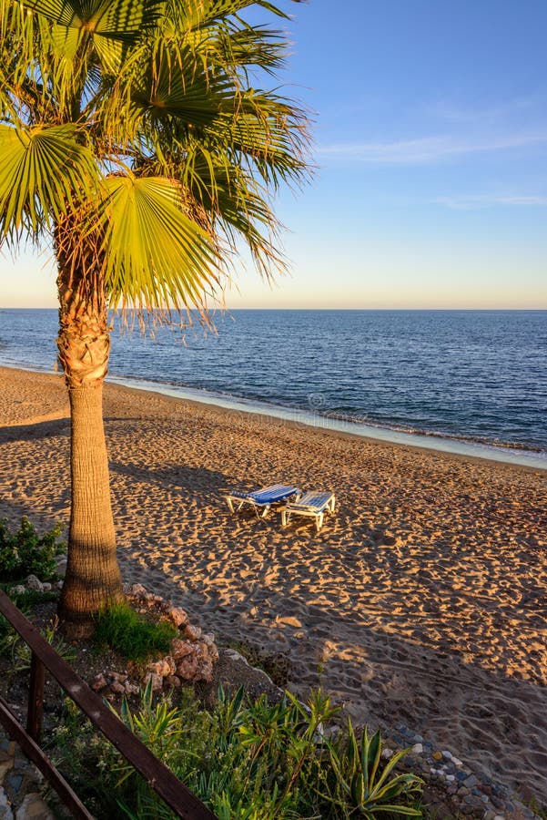 Marbella beach sunset stock photo. Image of water, spain - 61820504
