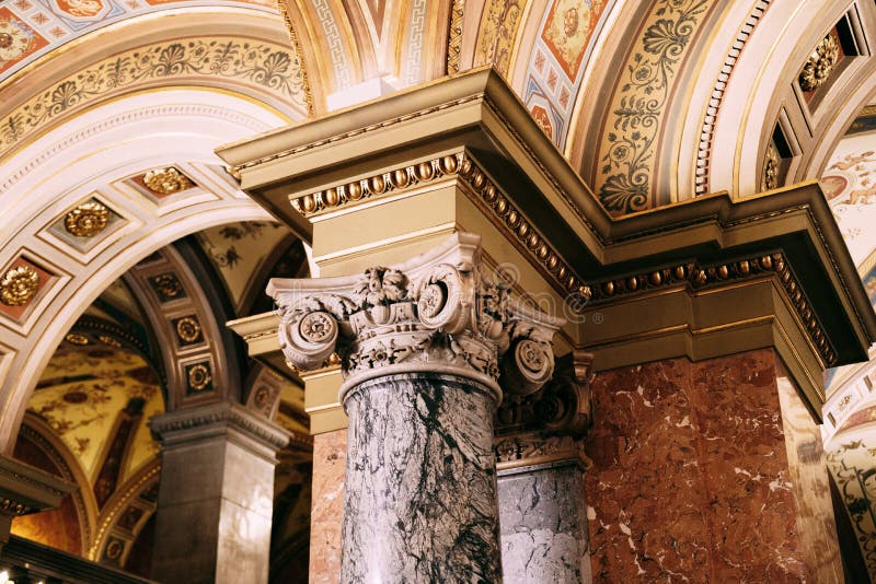 Marble Black and White Column with Curls Under the Arched Ceiling in ...