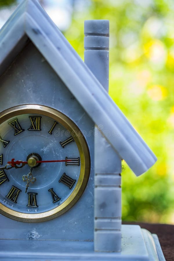 Marble clock on wood stock image. Image of bright, garden - 71797229