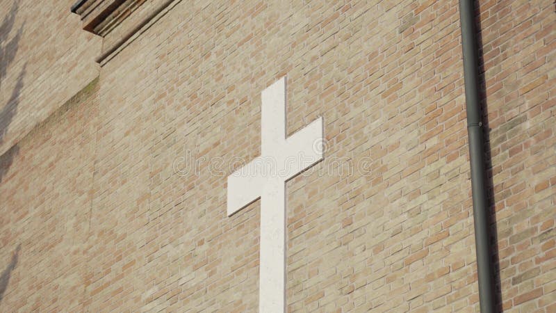 Marble Cross on a Brick Building Stock Footage - Video of building ...