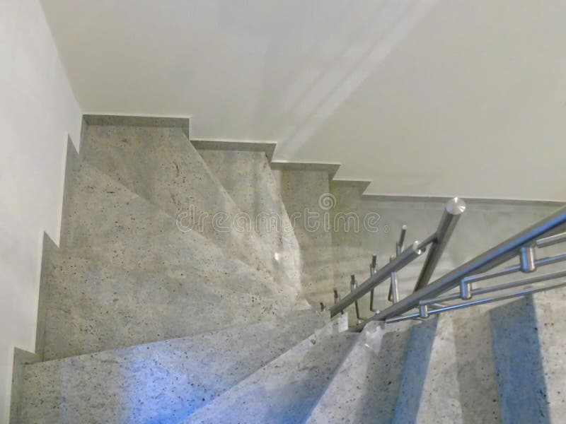 Iron Stairs with Railings in an Underground Cave. Clay Stalactites Hang ...