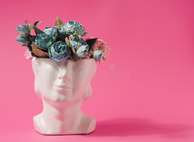 Marble Statue Head with Spring Flowers Inside. Stock Photo - Image of ...
