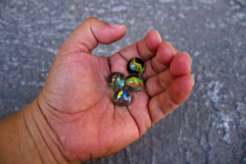 455 Marbles Hand Stock Photos - Free & Royalty-Free Stock Photos from ...