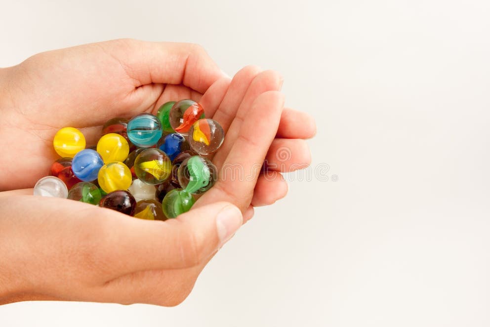 Marbles in Hands stock photo. Image of round, caucasian - 10937454