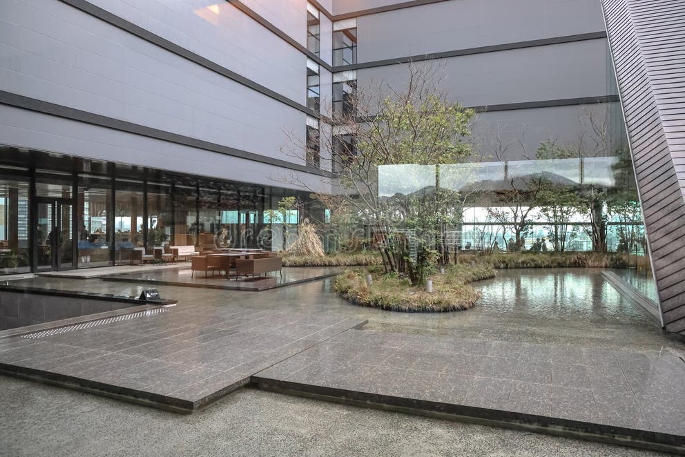 March 24 2025 Building Atrium with Water Features and Greenery, Japan ...