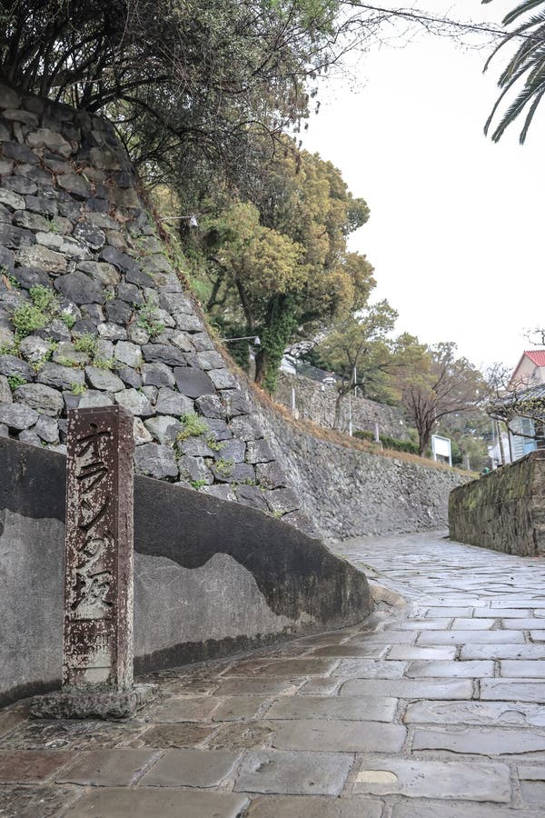 March 29 2025 Historic Cobbled Path Along Stone Wall and Greenery ...