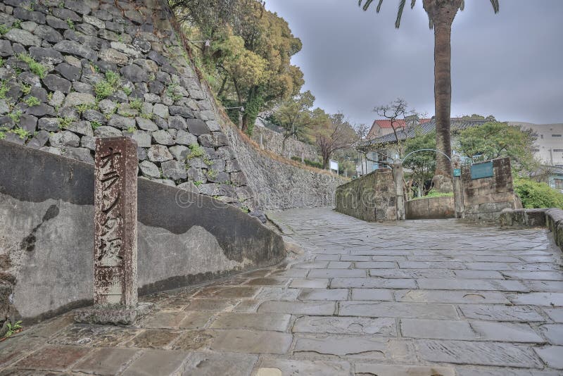 March 29 2025 Historic Cobbled Path Along Stone Wall and Greenery ...