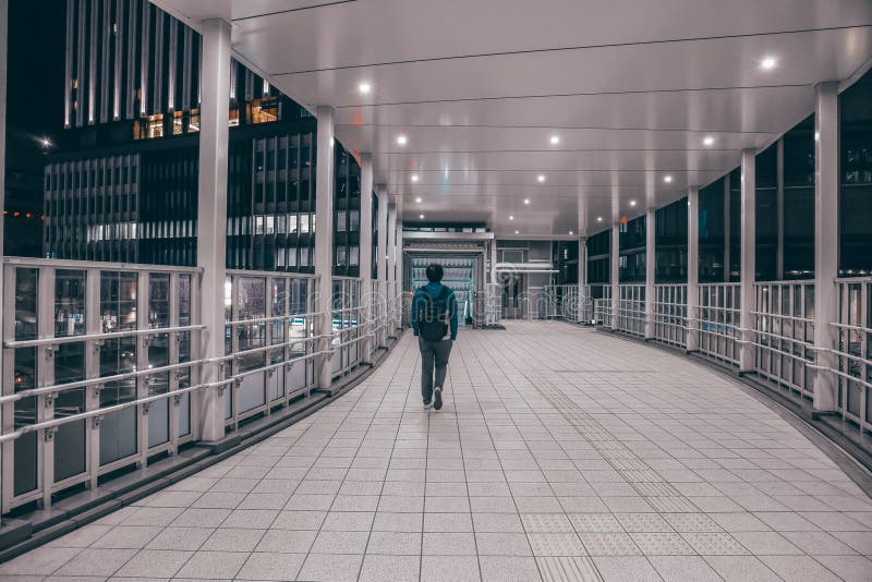 March 22 2025 a Modern Covered Pedestrian Walkway at Night, Japan ...