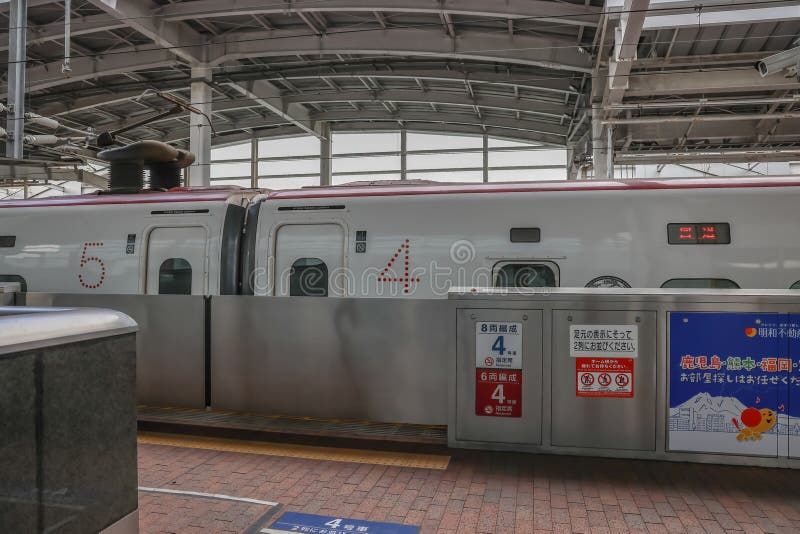 March 24 2025 Modern High-Speed Train at a Station Platform in an Urban ...