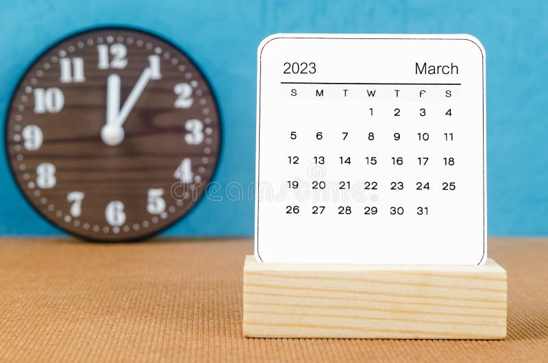 The March 2023 Monthly Calendar for 2023 Year with Clock on Wooden ...