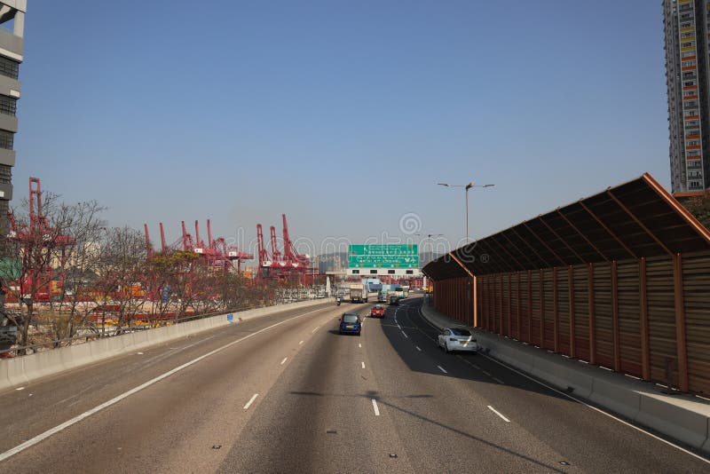 March 22 2025 Urban Highway with Modern Skyscrapers Under Clear Sky ...