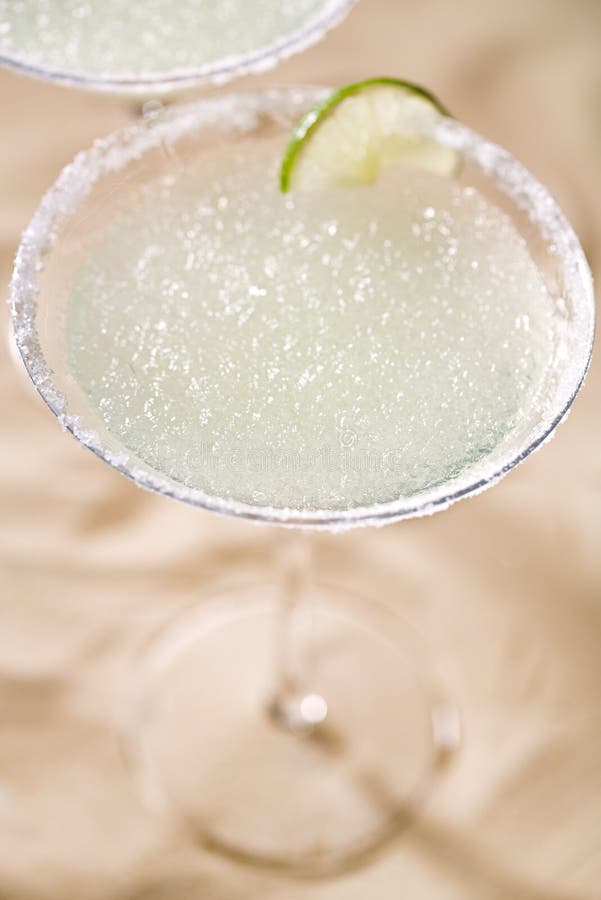 Margarita Cocktail on Beach, Blue Sea and Sky Background Stock Image ...