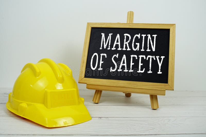 Margin of Safety Text on Blackboard with Safety Helmet on Wooden ...