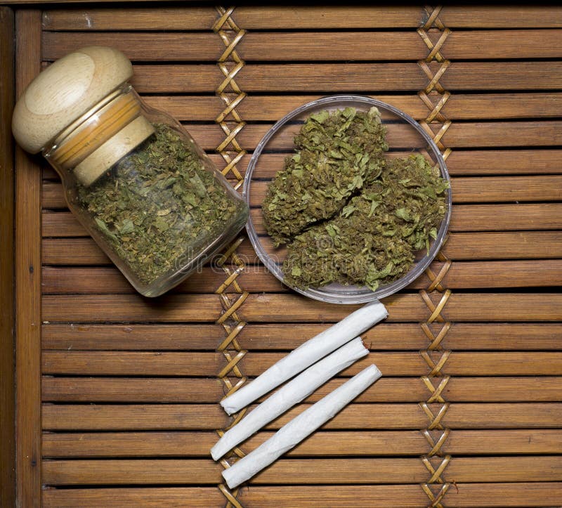 Marijuana on a bamboo tray stock photo. Image of foliage - 41826456