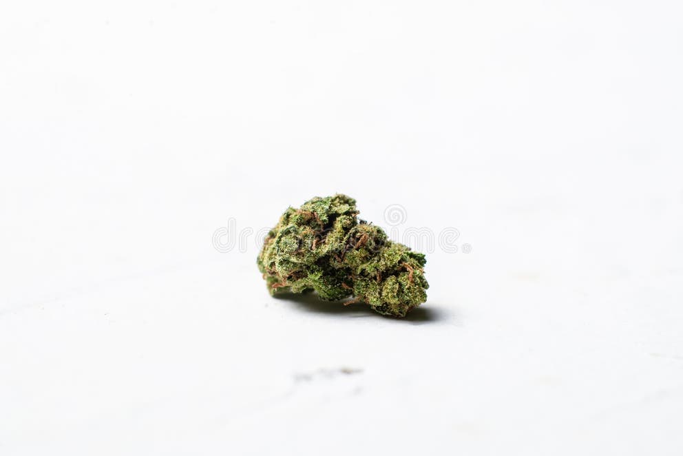 Marijuana Bud on a White Background. Microdosing Concept Stock Photo ...