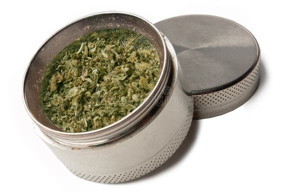 Marijuana grinder stock image. Image of exhale, high - 21984263