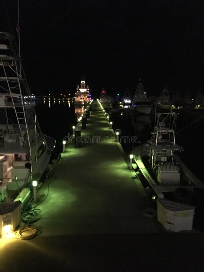 Marina dock at night stock photo. Image of boats, marina - 115973308