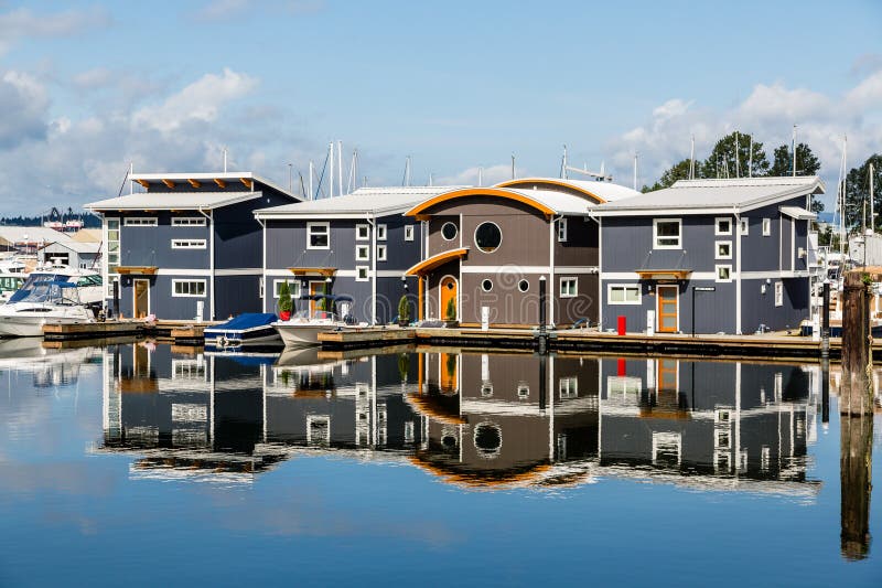 Marina Homes Reflected stock photo. Image of house, water - 75999778