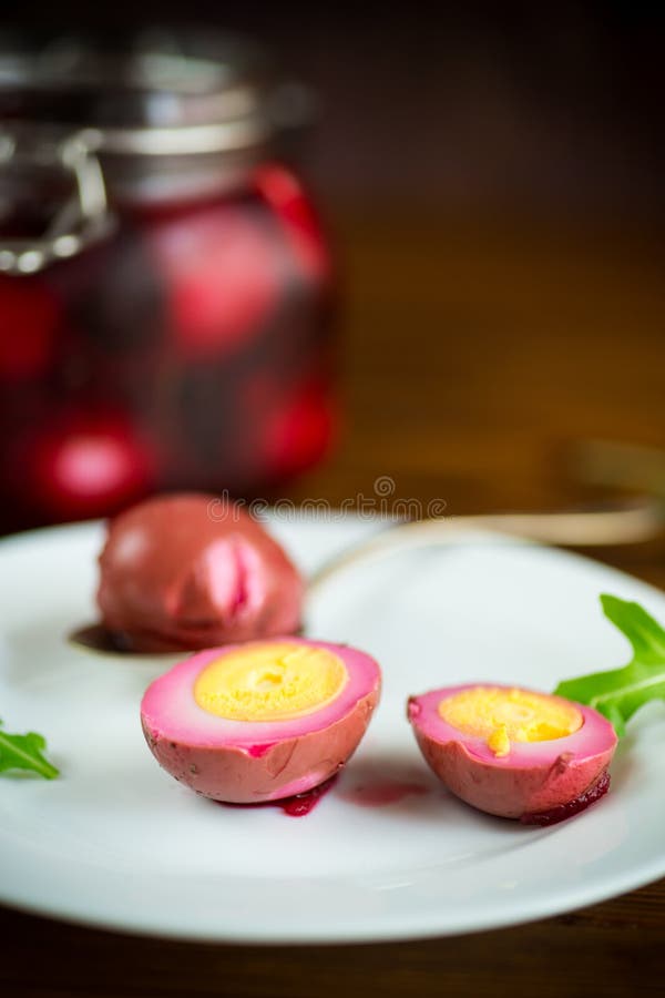 Marinated Chicken Eggs in Beetroot Marinade in a Plate Stock Photo ...
