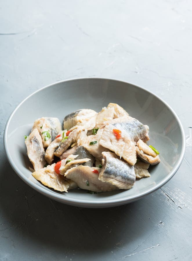 Marinated Fish Fillet with Vegetables and Spices on the Rustic ...