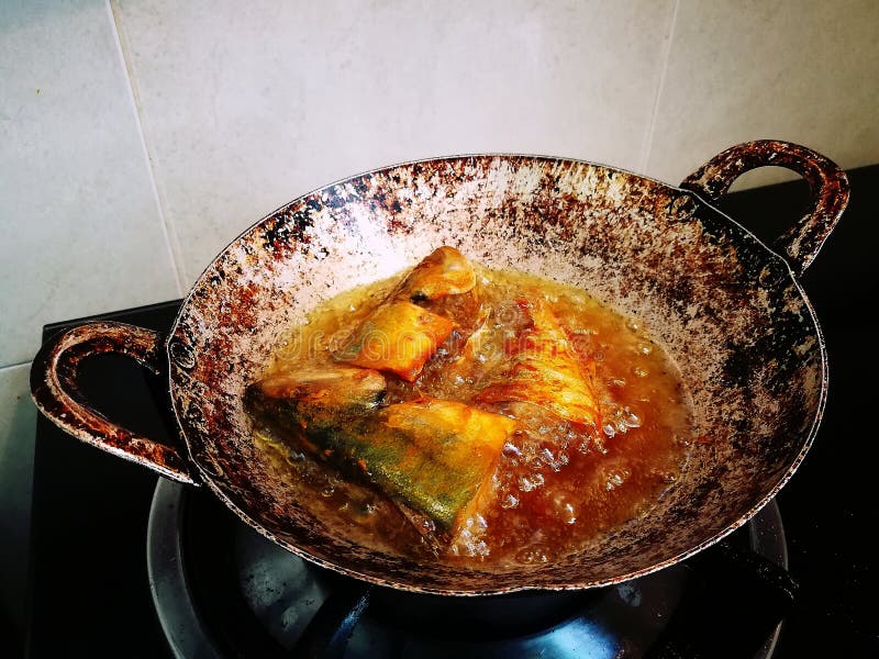 Marinated Fish with Seasoning is Fried in a Pan. Stock Image - Image of ...
