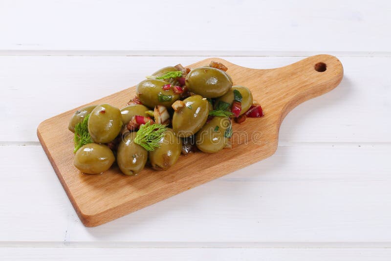 Marinated green olives stock image. Image of board, pile - 91928117