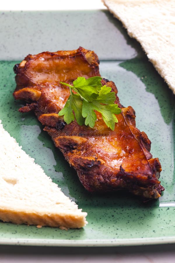 Marinated and Grilled Ribs Served with Toast Bread Stock Photo - Image ...