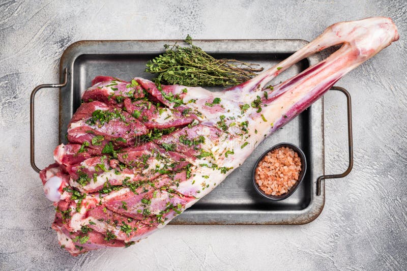 Marinated with Herbs and Olive Oil Raw Goat Leg. White Background Stock ...