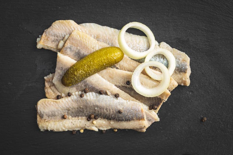 Marinated Herring Fish on Kitchen Table Stock Photo - Image of plate ...