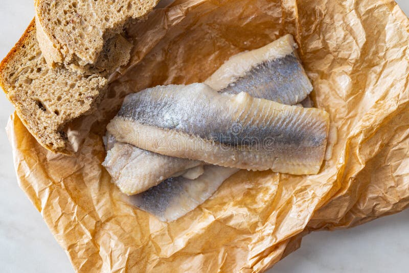 Marinated Herring Fish on Paper Stock Image - Image of delicacy, dish ...