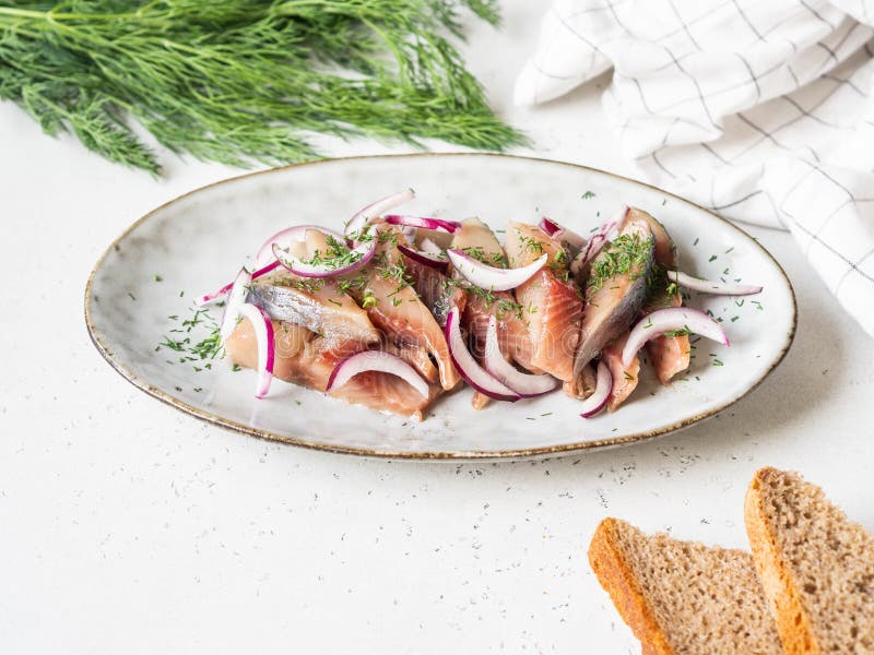 Marinated Herring Fish Slices with Fresh Dill and Red Onion, Rye Bread ...
