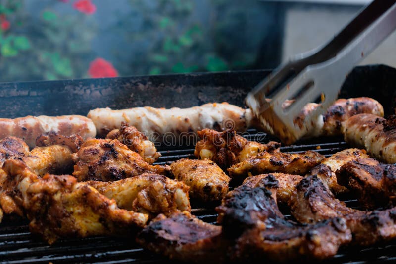 Marinated Meat, Chicken, Ribs and Sausages Put on the Barbecue Stock ...