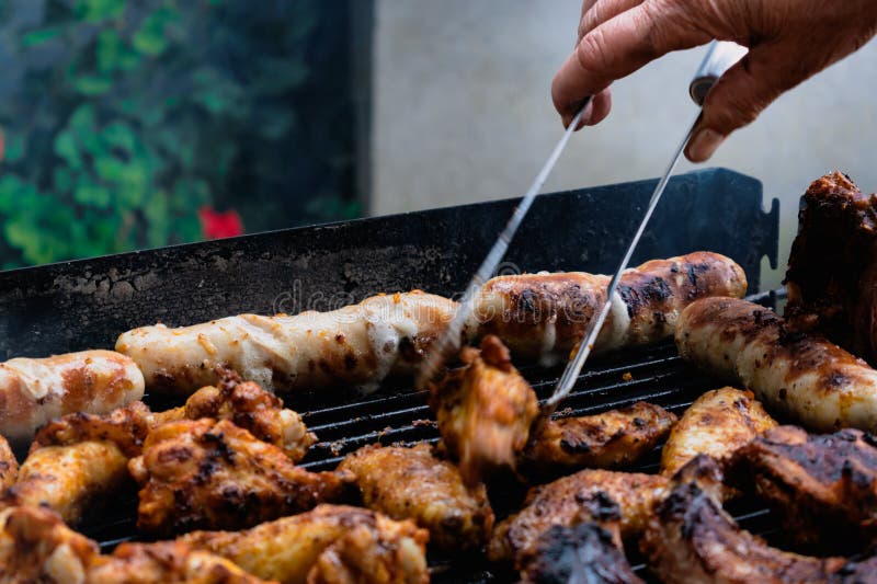 Marinated Meat, Chicken, Ribs and Sausages Put on the Barbecue Stock ...