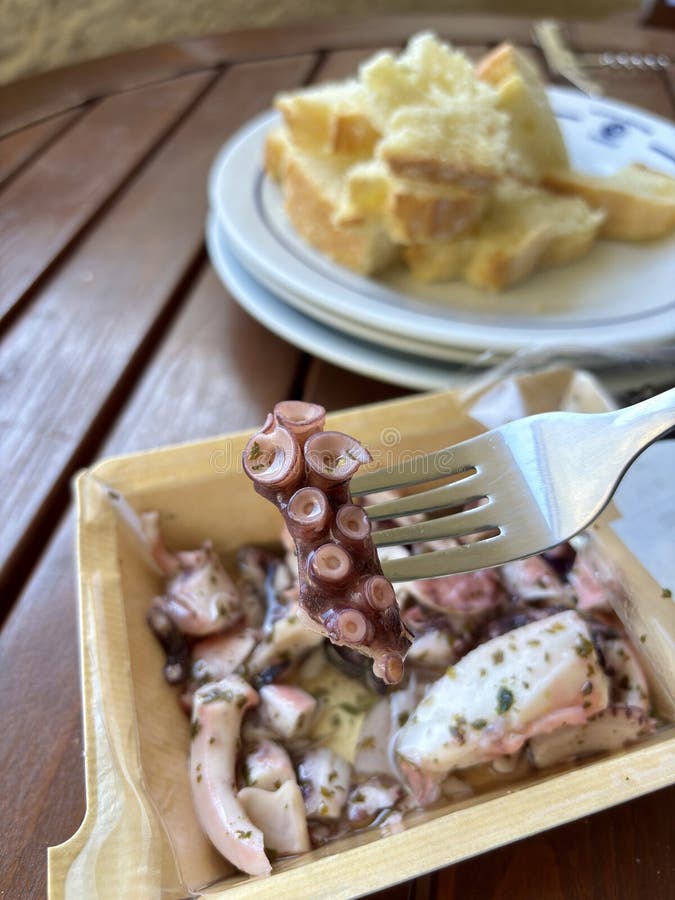 Marinated Octopus on Fork Ready To Eat Stock Photo - Image of tentacle ...