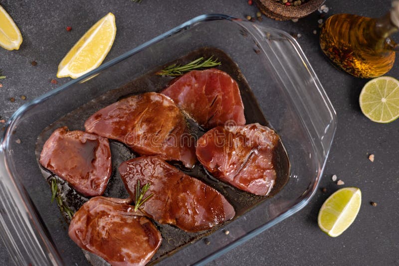 Marinated Pieces of Fresh Tuna Fish Fillet in Glass Cooking Dish on a ...
