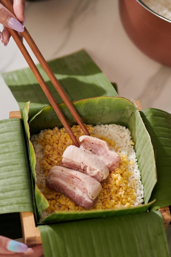 Marinated Pork Inside Rice Cake Stock Image - Image of closeup, female ...