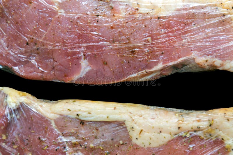 Marinated Raw Beef Steak Wrapped in Plastic Stock Photo - Image of ...