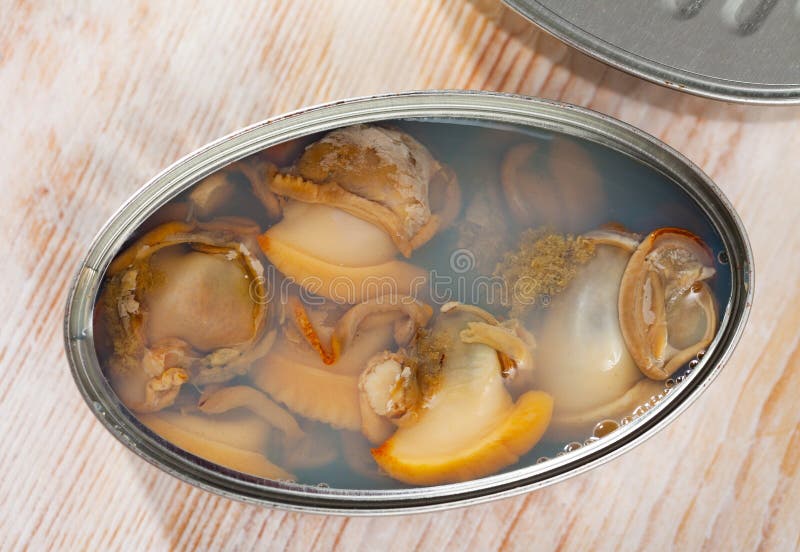 Marinated Shellfish in an Open Tin Can on Wooden Table Stock Image ...