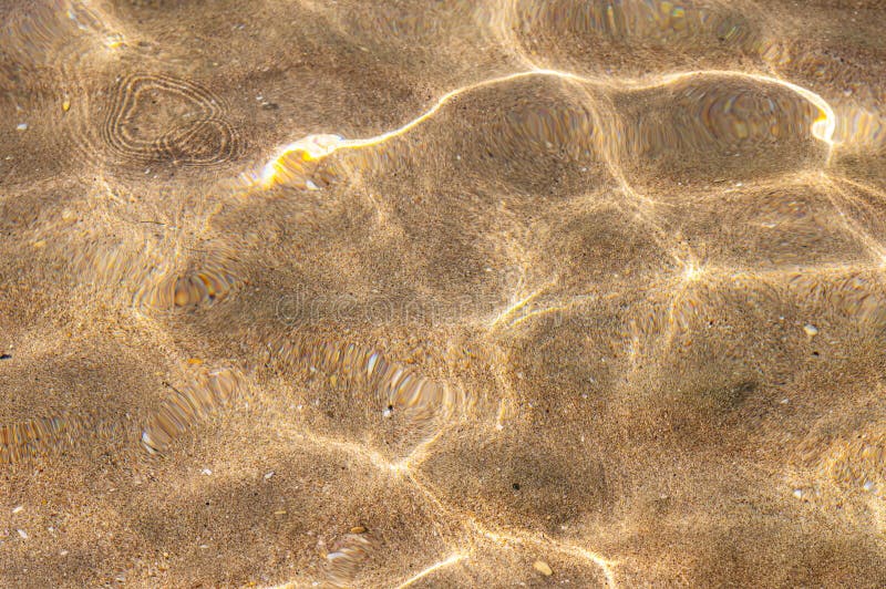 Marine Background Sea Bottom with Sun Glare. View through the Sandy ...